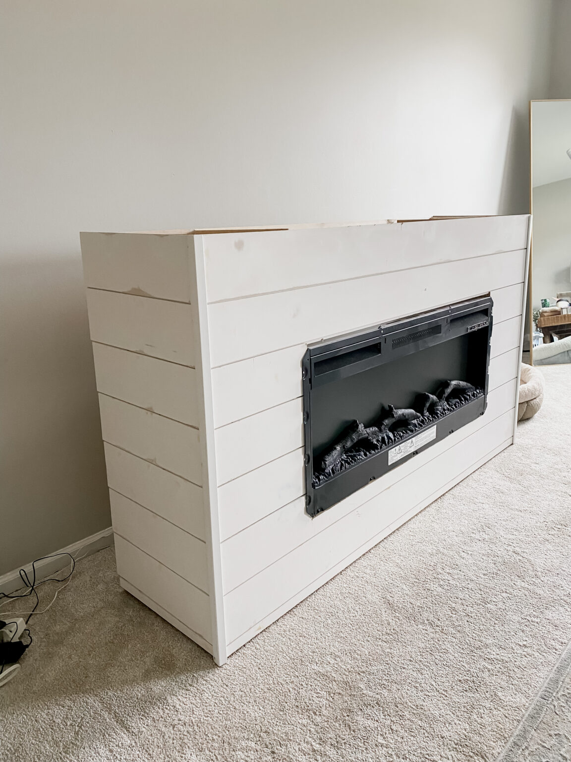 How to Build a DIY Fireplace with Hidden Storage - Come Stay Awhile by ...